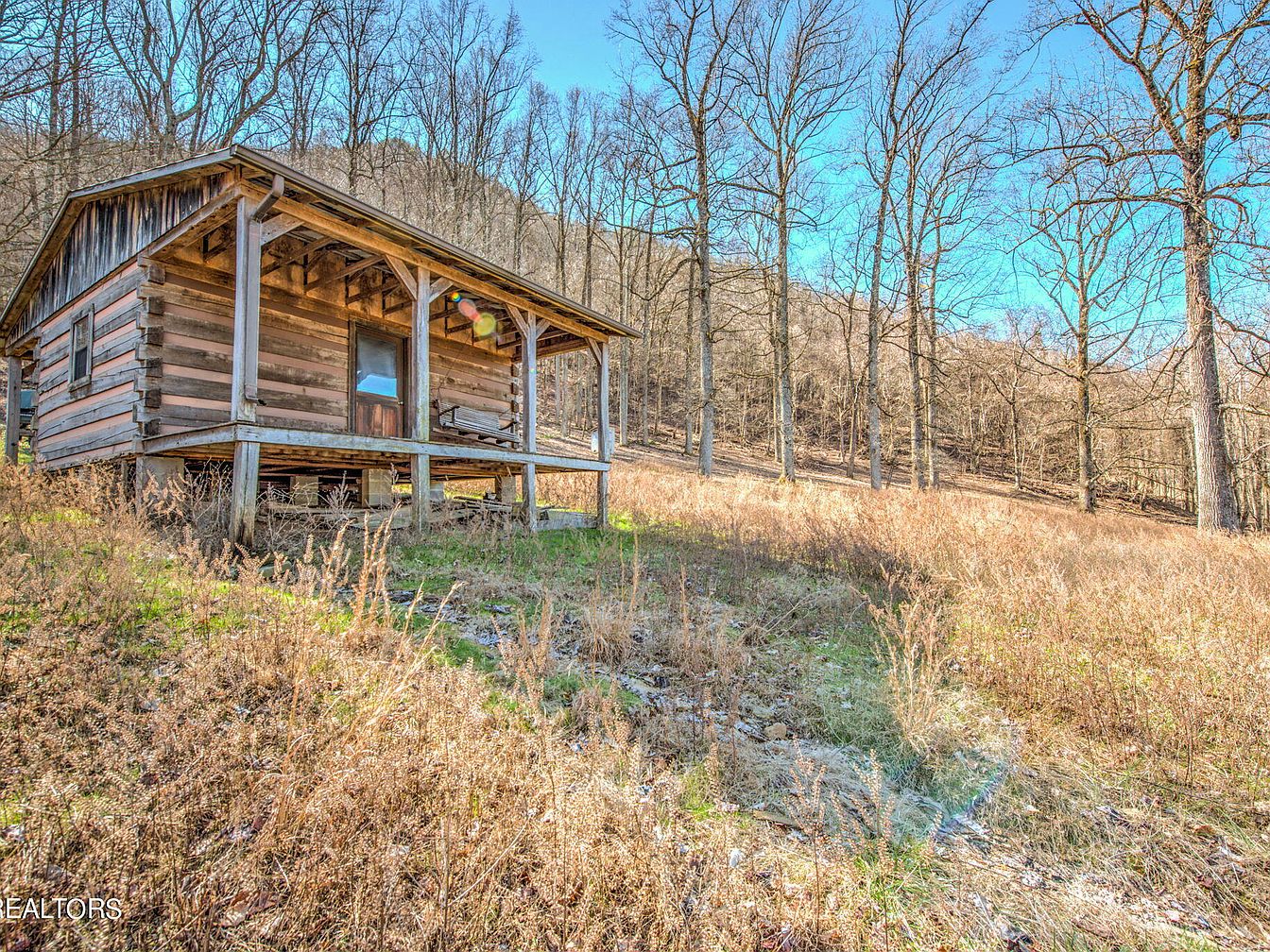 Discover a 1900 Farmhouse Oasis in Townsend, Tennessee with 160 Acres ...